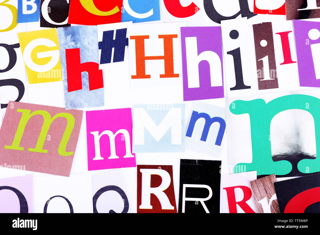 Colorful newspaper letters as background Stock Photo - Alamy