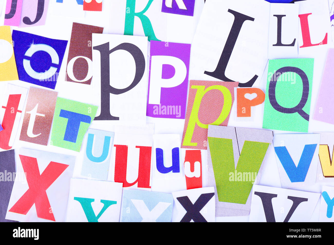 Colorful newspaper letters as background Stock Photo - Alamy