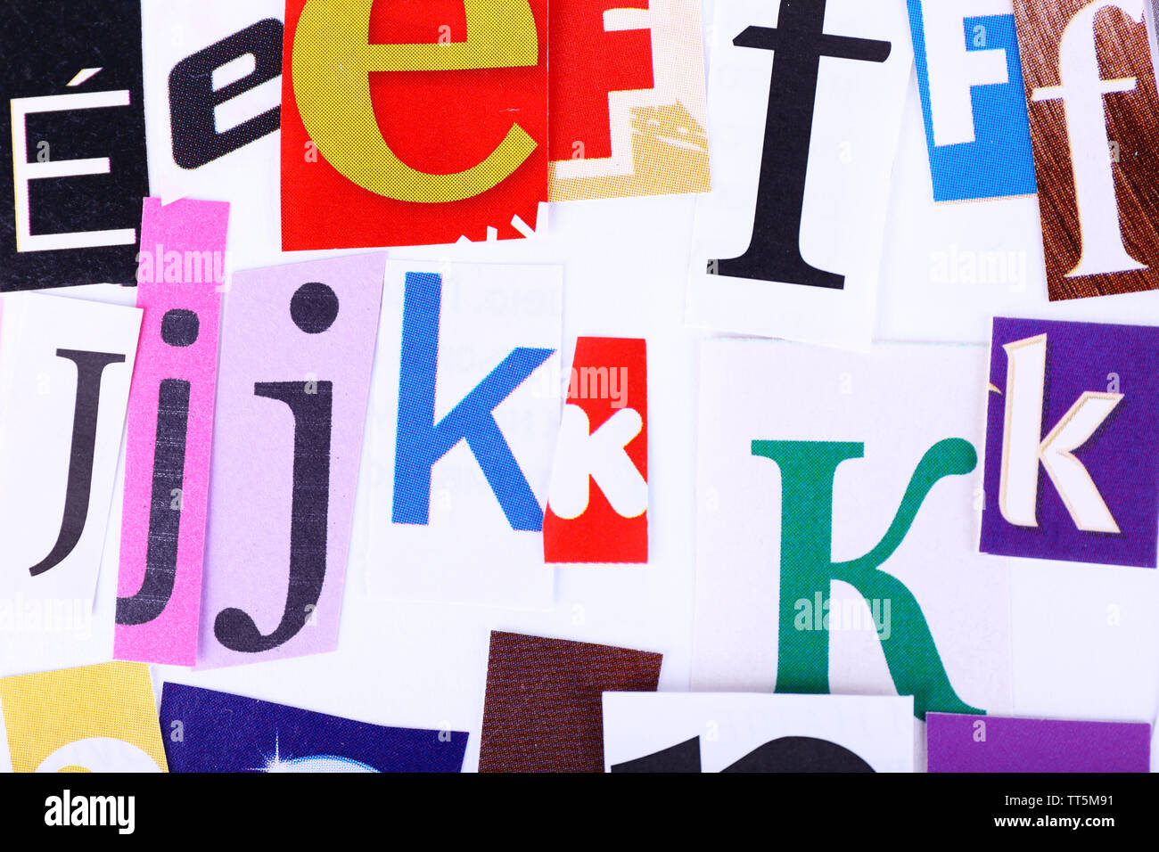 Colorful newspaper letters as background Stock Photo - Alamy