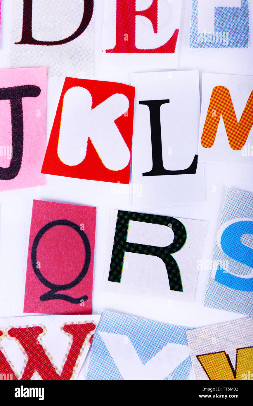 Colorful newspaper letters as background Stock Photo - Alamy