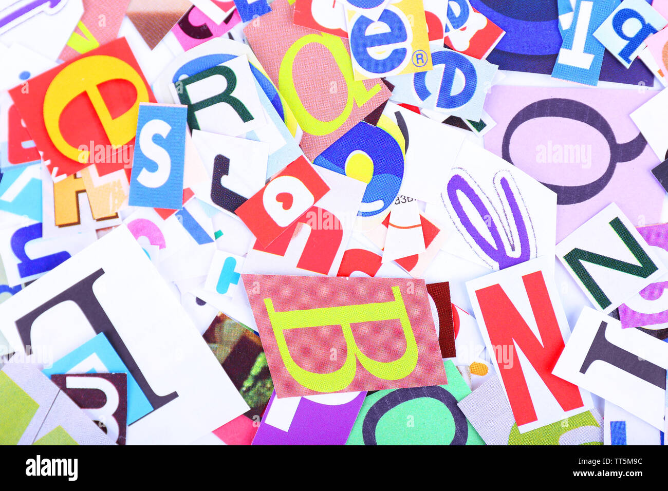 Colorful newspaper letters as background Stock Photo - Alamy
