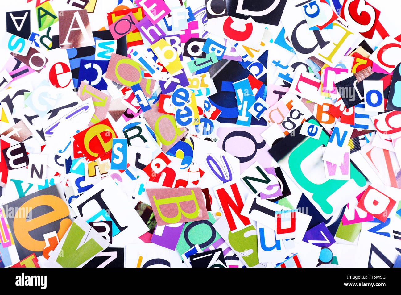 Colorful newspaper letters as background Stock Photo - Alamy