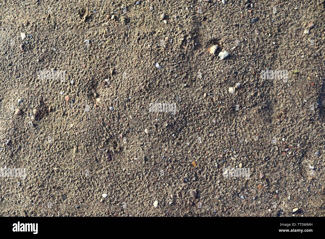 Close up detailed view on sandy ground surfaces in high resolution ...