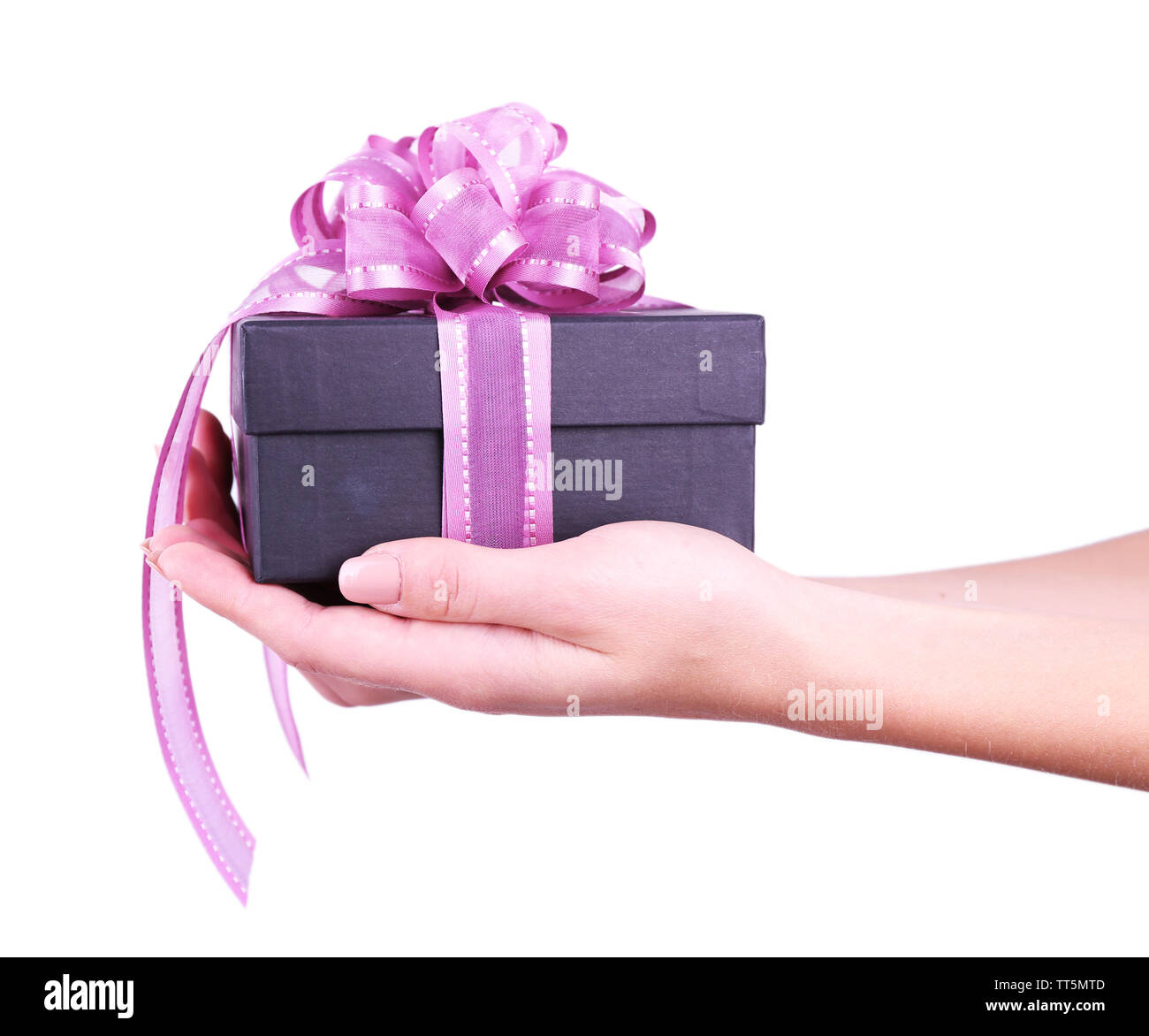Woman's hand holding gift box isolated on white Stock Photo - Alamy