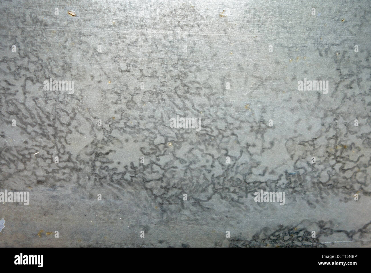 backdrop of steel with acid markings and patterns Stock Photo - Alamy