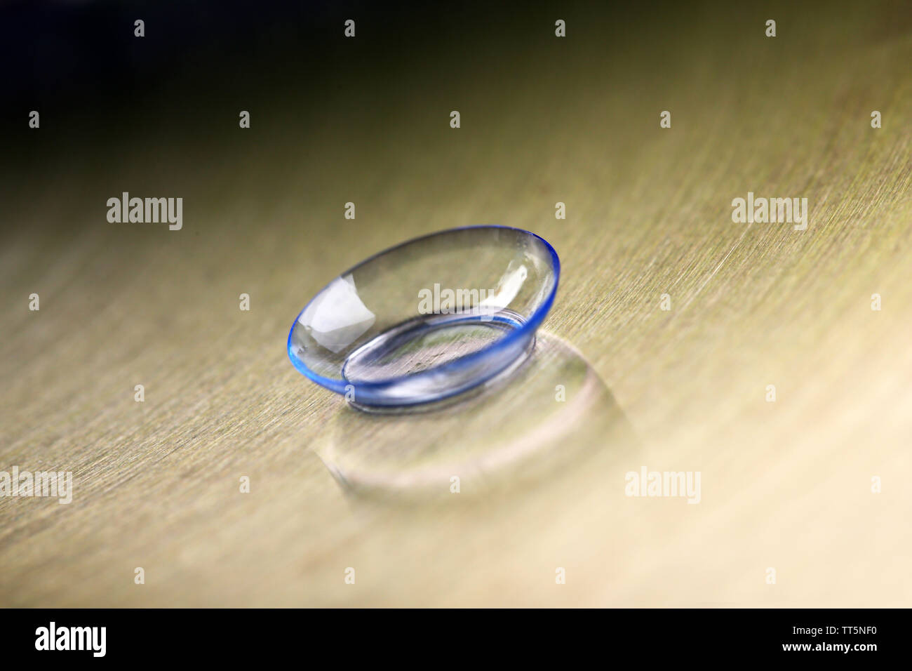 Close up single contact lens hi-res stock photography and images - Alamy