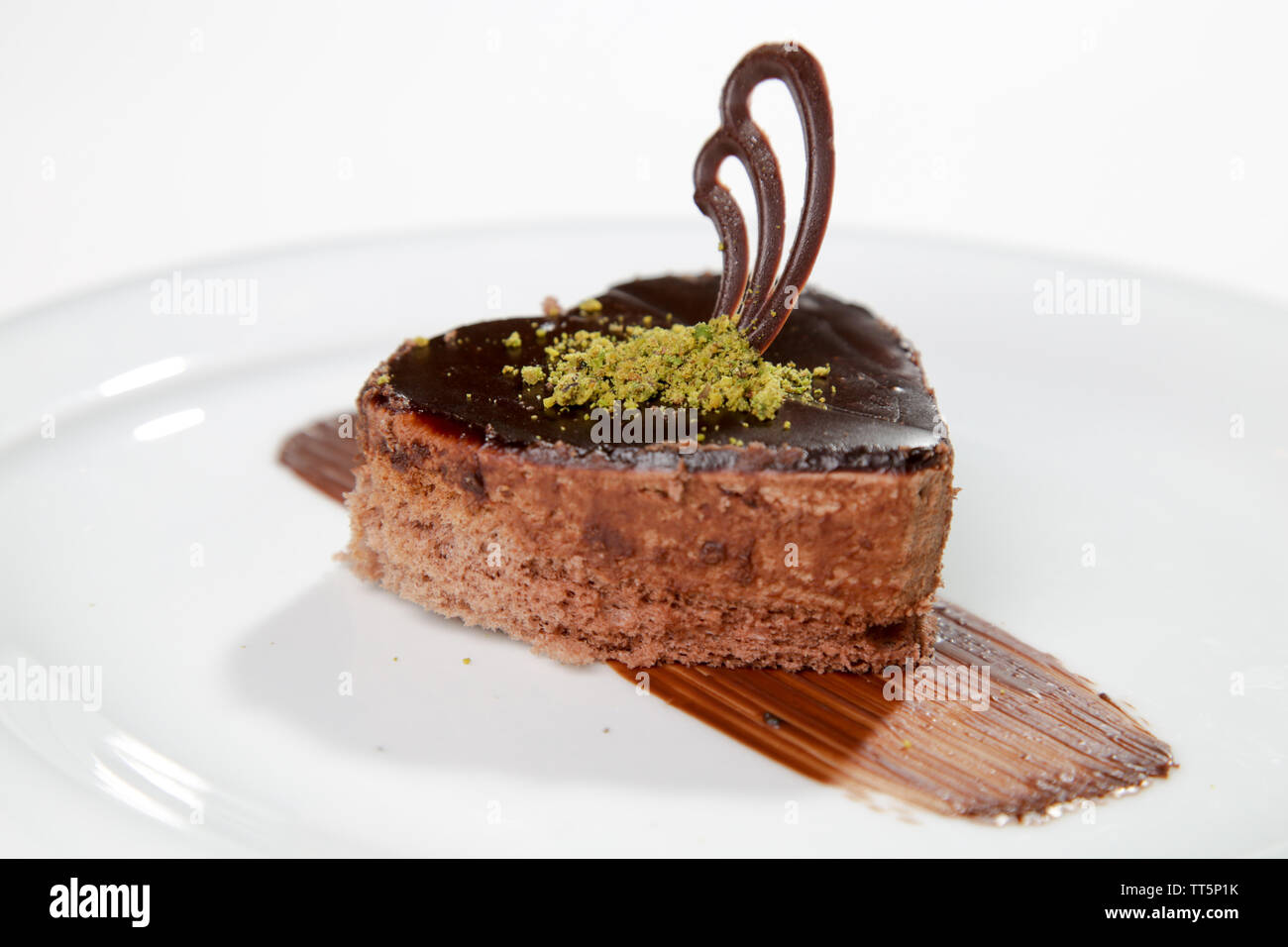 hearth shaped chocolate cake isolated white Stock Photo - Alamy