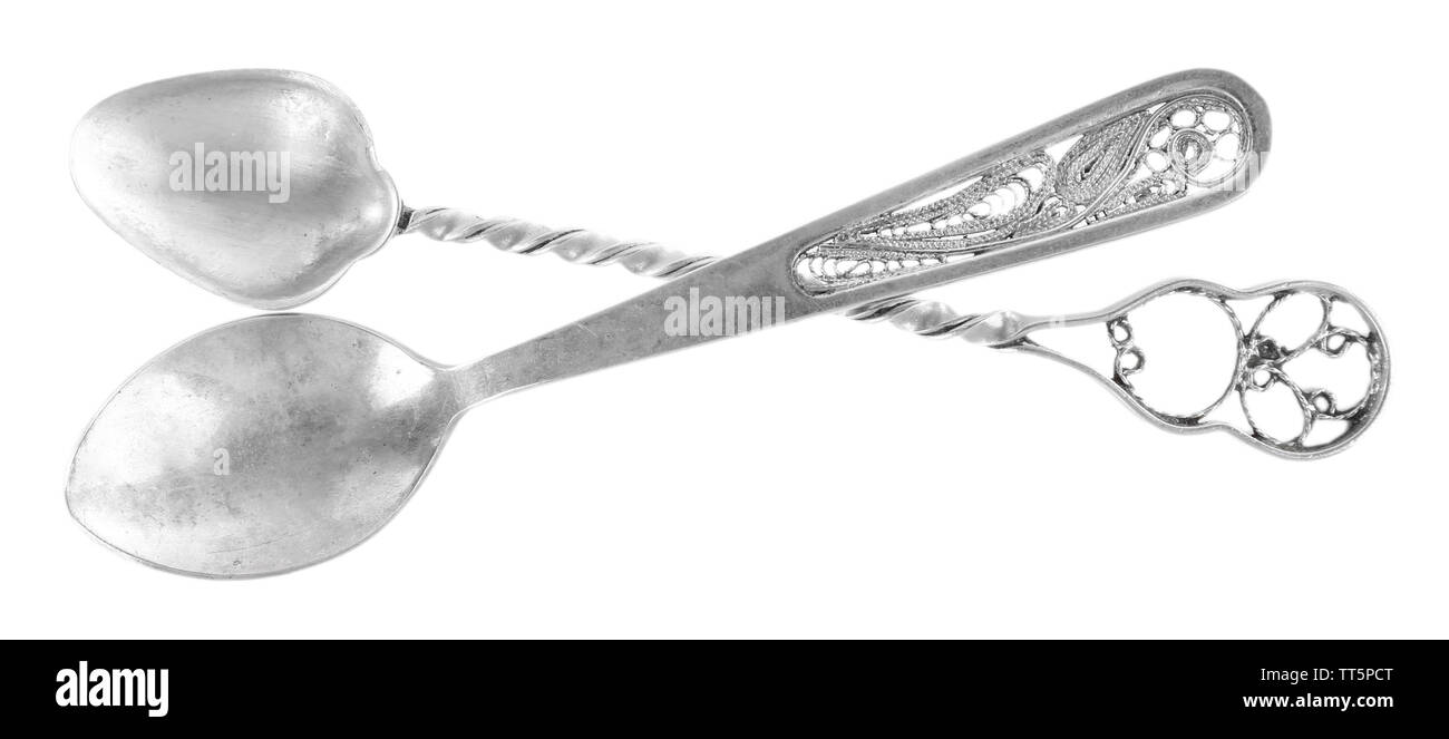 Pair of teaspoons hi-res stock photography and images - Alamy