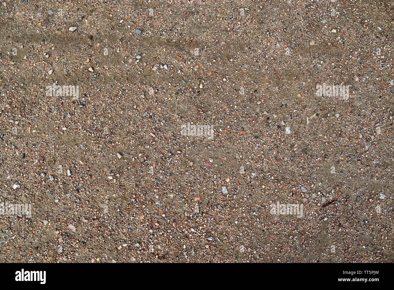 Close up detailed view on sandy ground surfaces in high resolution ...