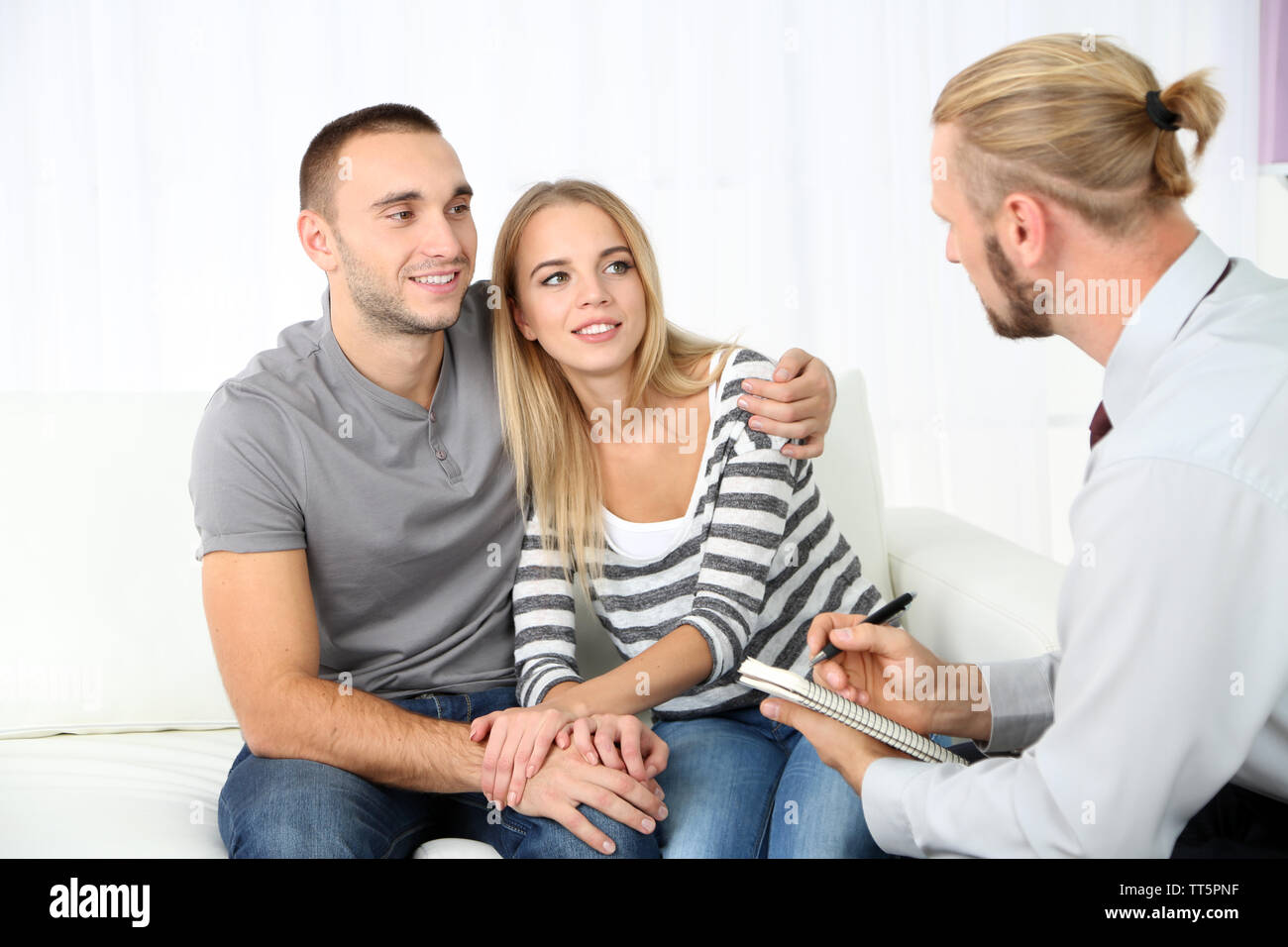 Young happy couple after therapy session with family psychologist Stock ...