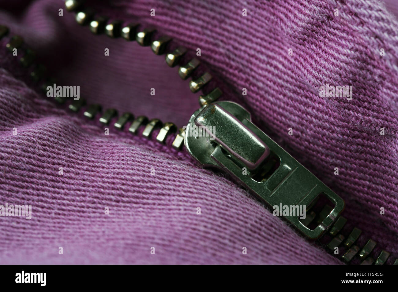 Zipper on clothes close up Stock Photo - Alamy
