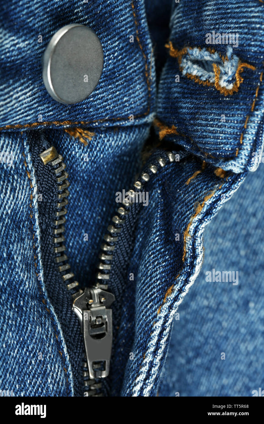 Zipper and button on clothes close up Stock Photo - Alamy