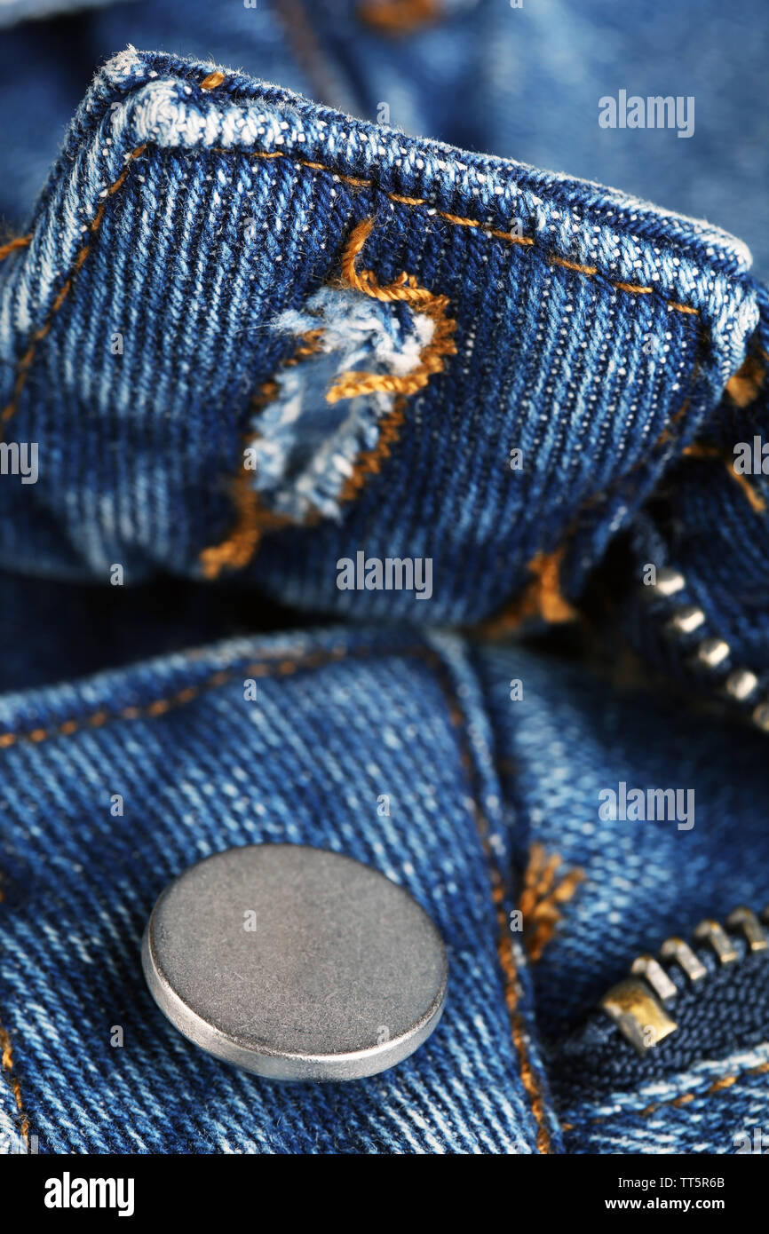 Zipper and button on clothes close up Stock Photo - Alamy