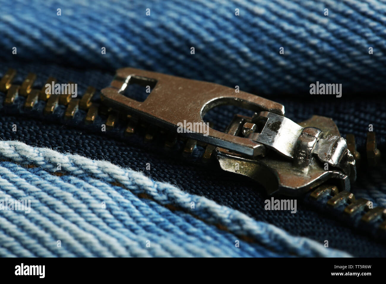 Zipper on clothes close up Stock Photo - Alamy