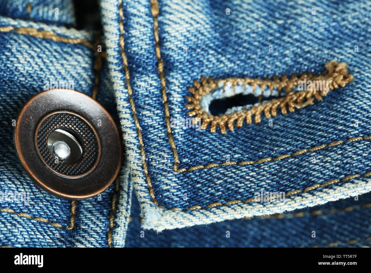 Button on clothes close up Stock Photo - Alamy