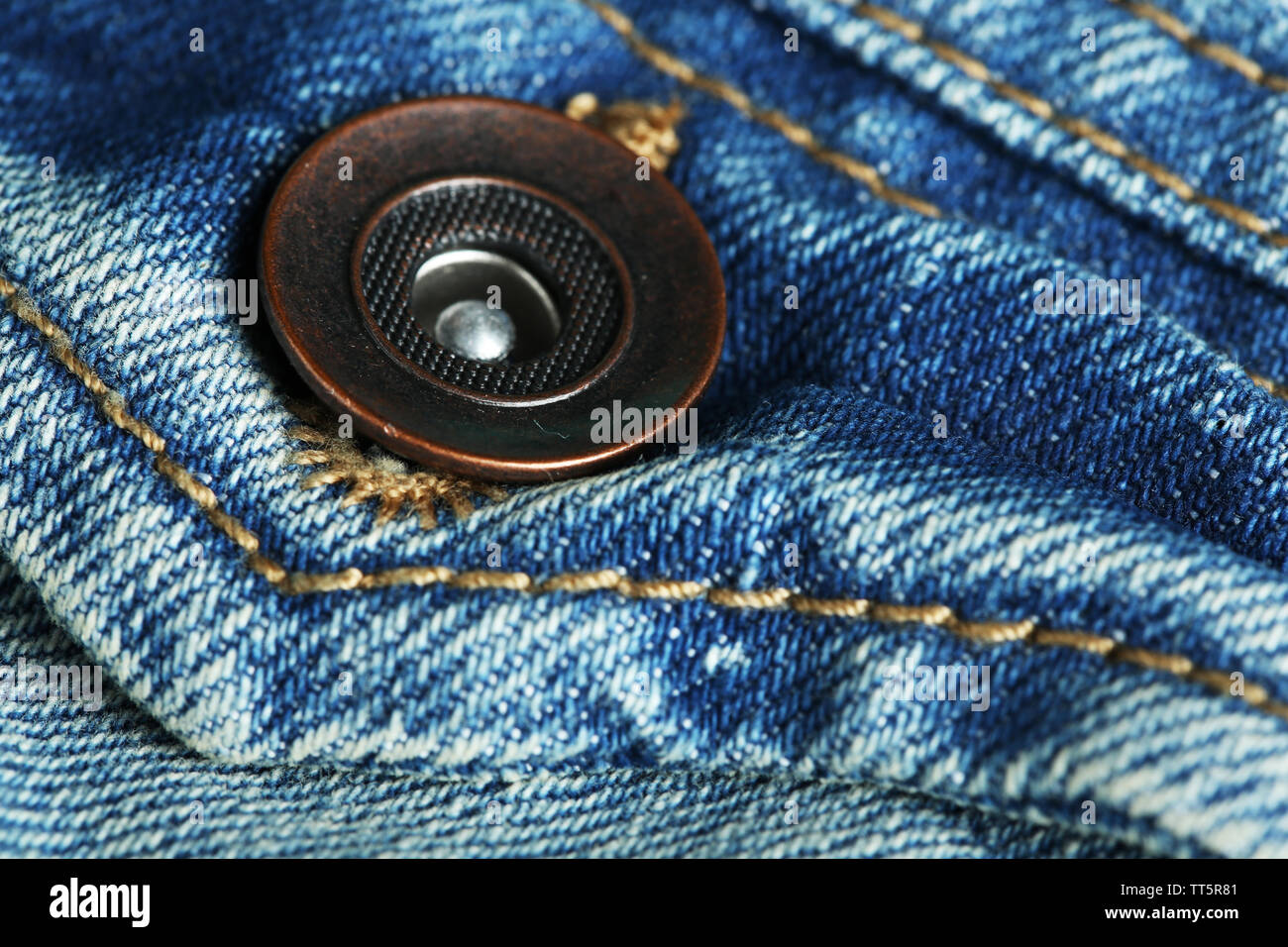 Button on clothes close up Stock Photo - Alamy