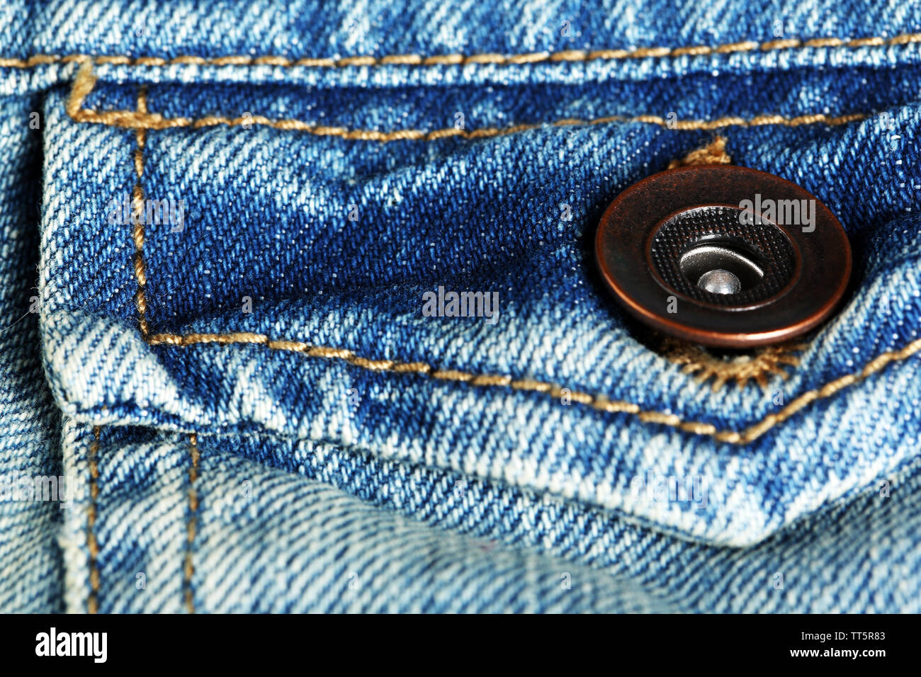 Button on clothes close up Stock Photo - Alamy