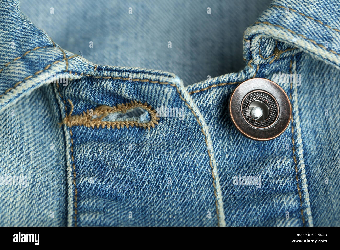 Button on clothes close up Stock Photo - Alamy