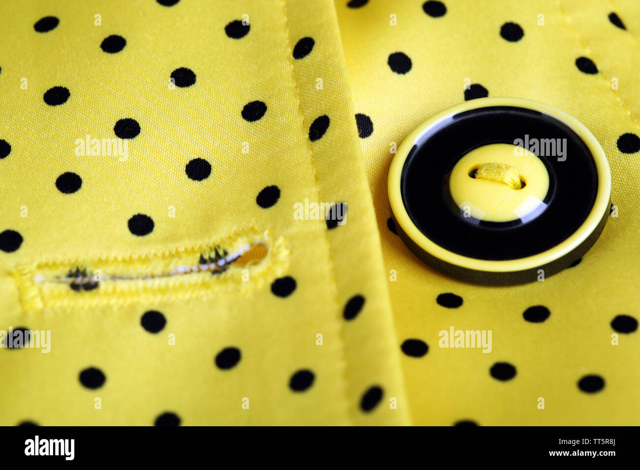 Button on clothes close up Stock Photo - Alamy