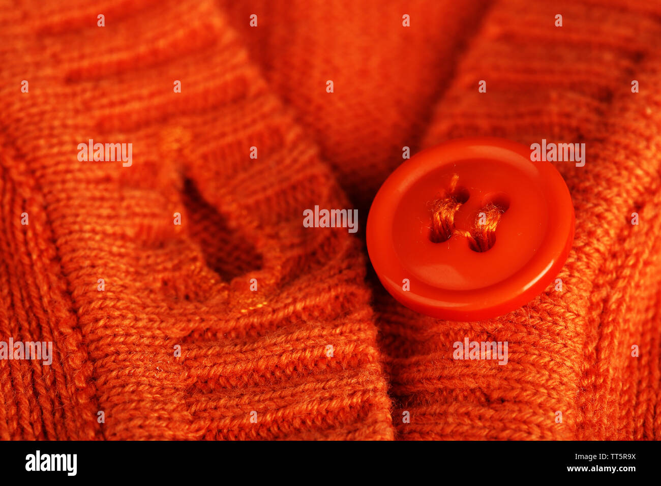Button on clothes close up Stock Photo - Alamy