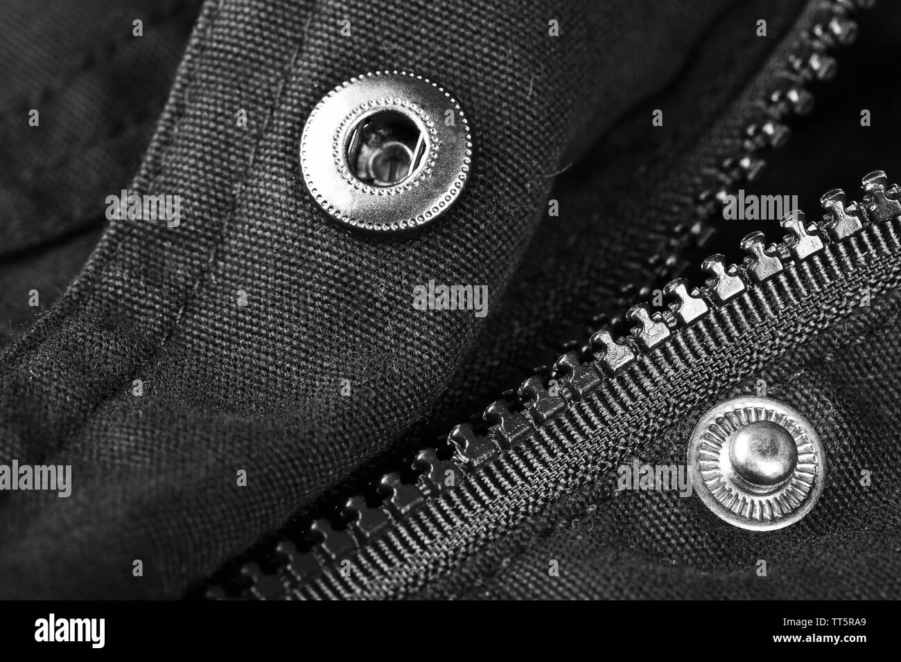 Zipper and button on clothes close up Stock Photo - Alamy