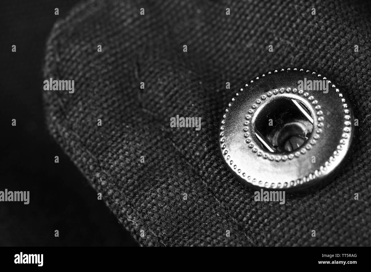 Button on clothes close up Stock Photo - Alamy