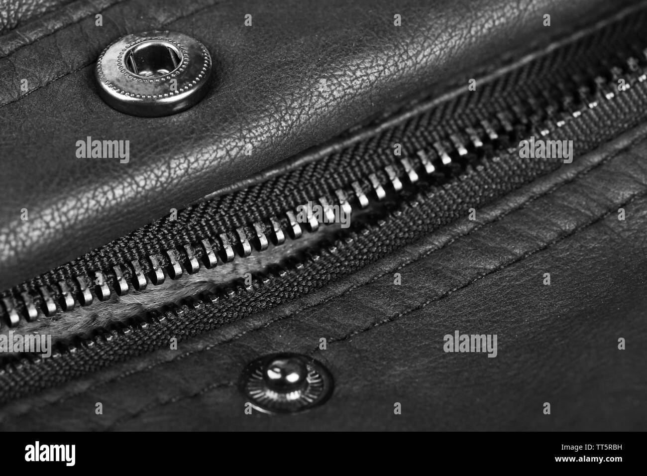 Zipper and button on clothes close up Stock Photo - Alamy