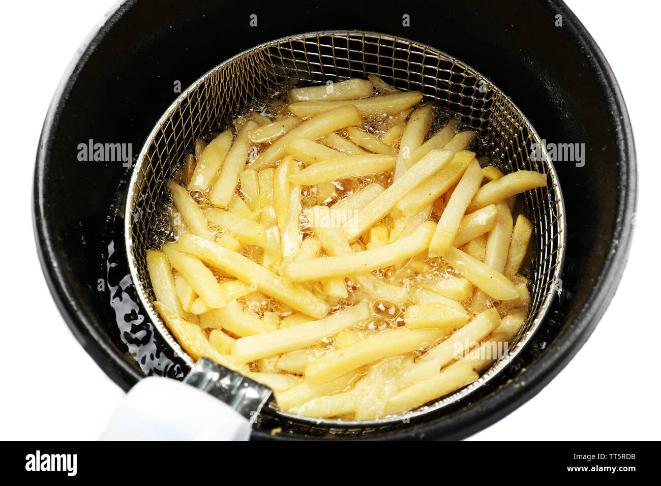 French fries in deep fryer, closeup Stock Photo - Alamy
