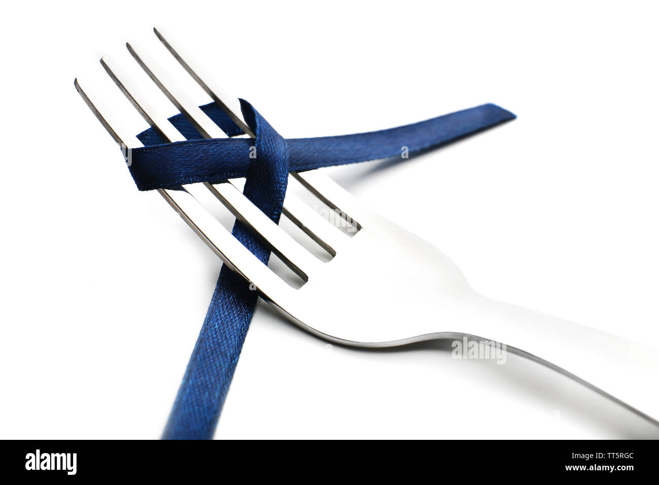 Stages of tying bow on fork close-up Stock Photo - Alamy