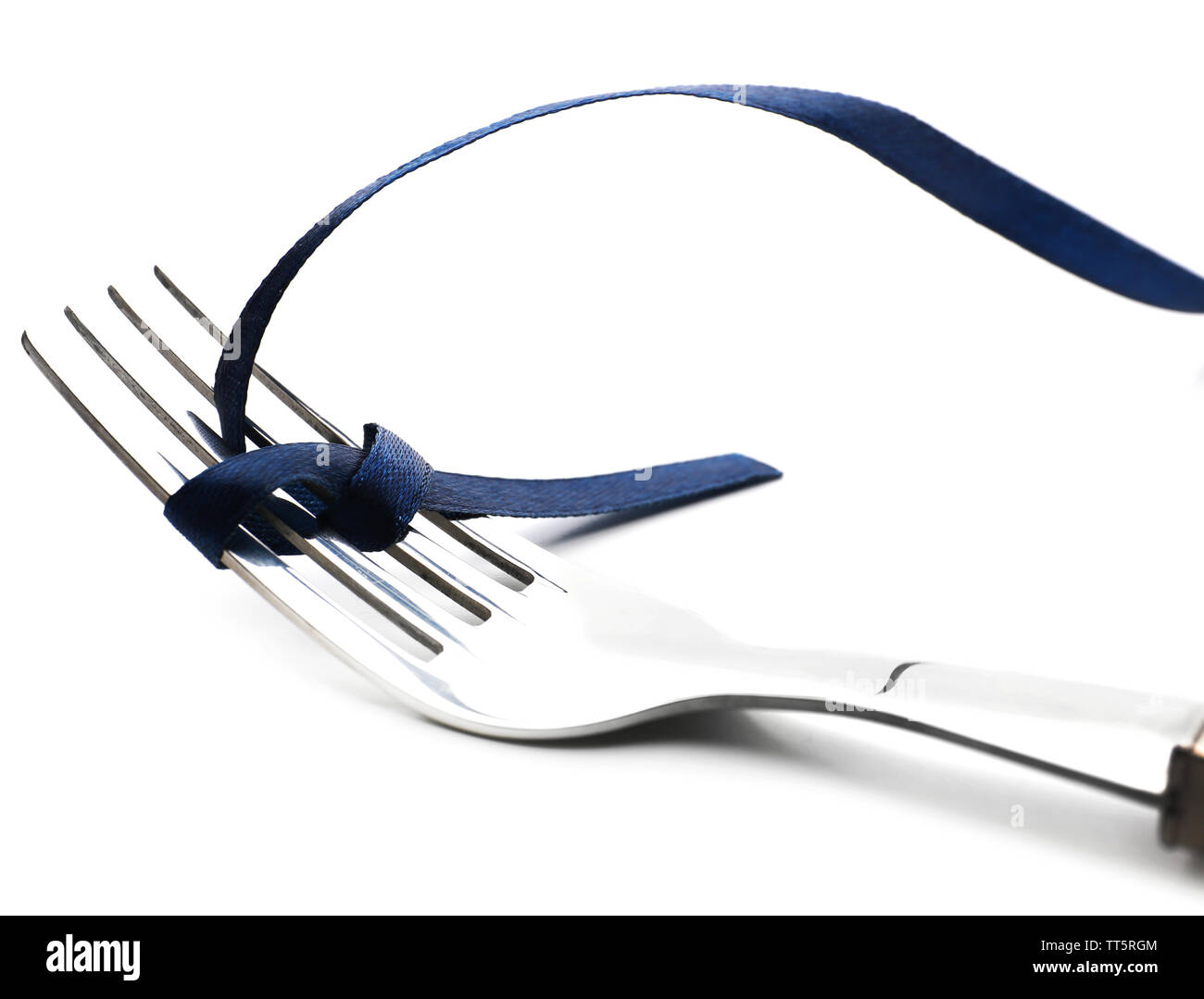 Stages of tying bow on fork close-up Stock Photo - Alamy