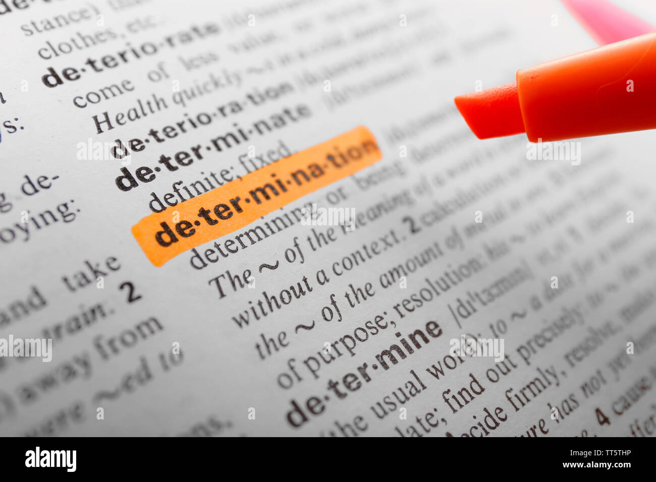 Orange marker highlighting word in dictionary Stock Photo - Alamy