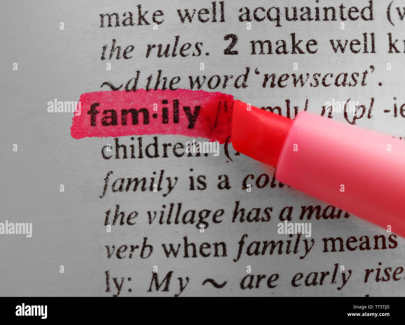 Pink marker highlighting word in dictionary Stock Photo - Alamy