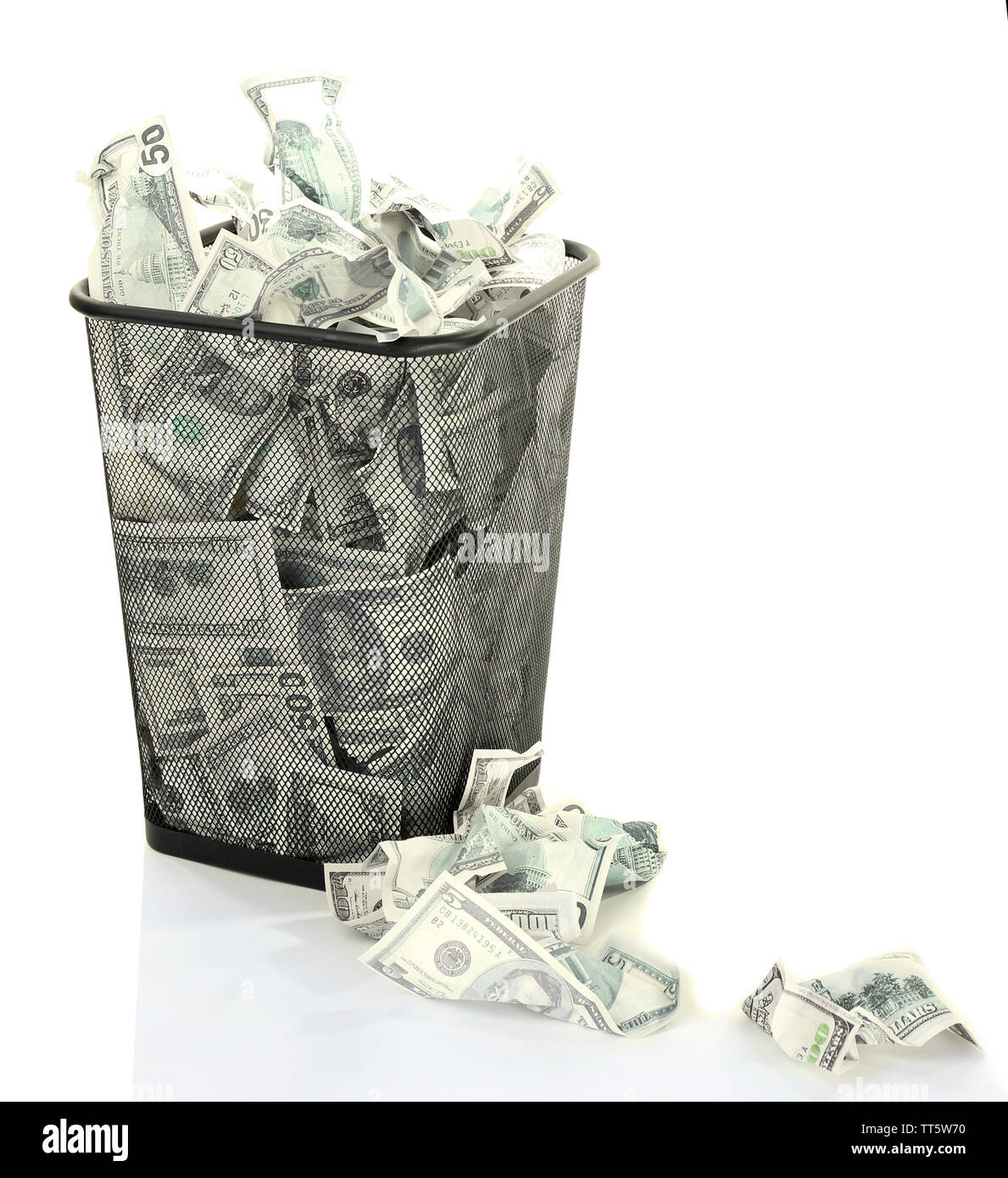 Money in dustbin isolated on white Stock Photo - Alamy