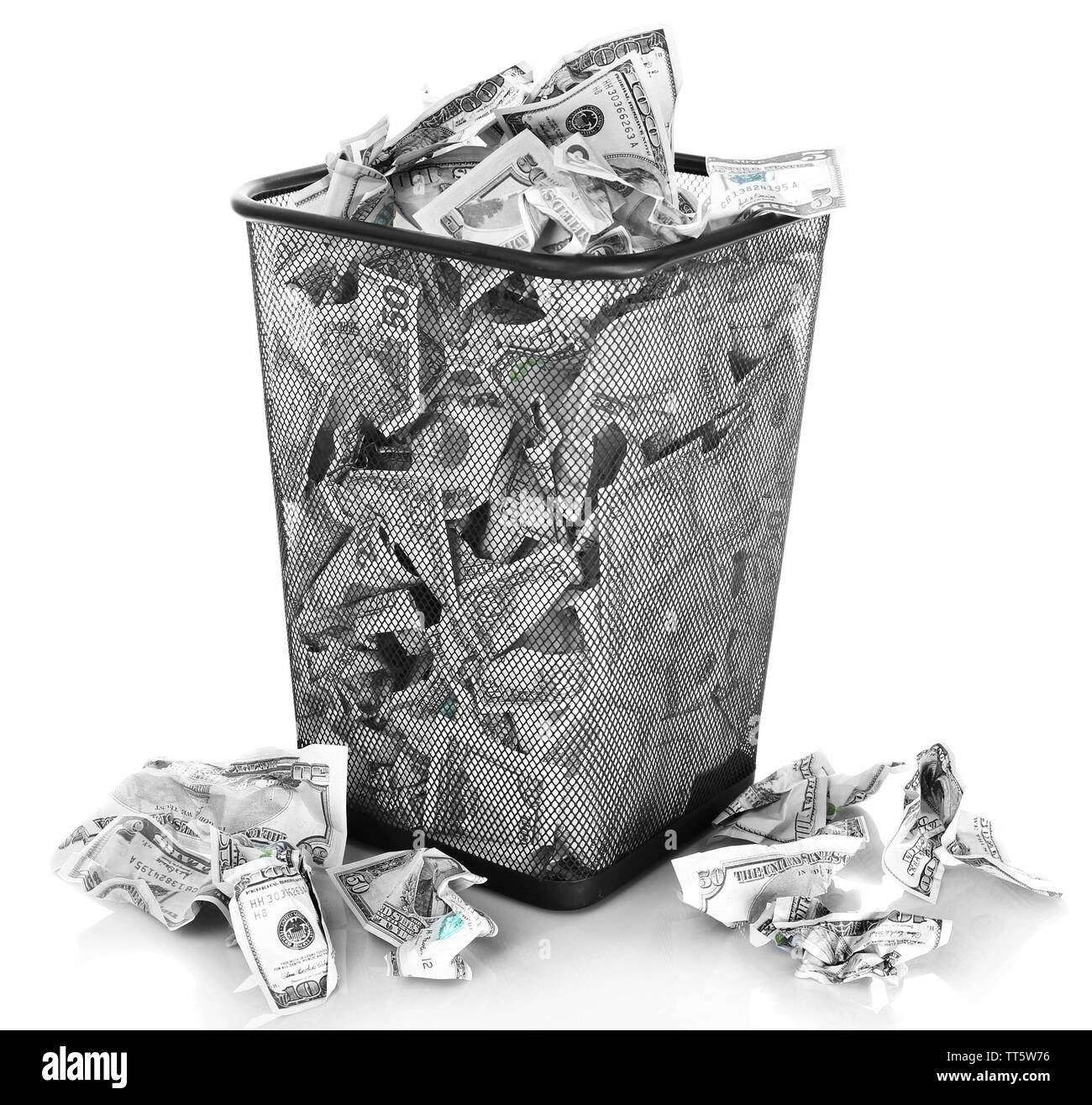 Money in dustbin isolated on white Stock Photo - Alamy
