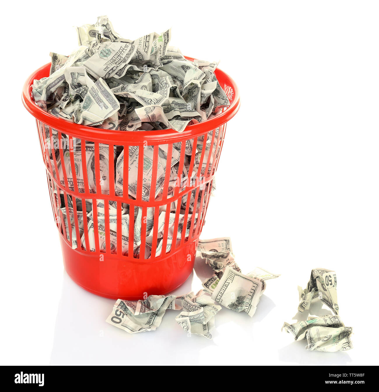 Money in dustbin isolated on white Stock Photo - Alamy