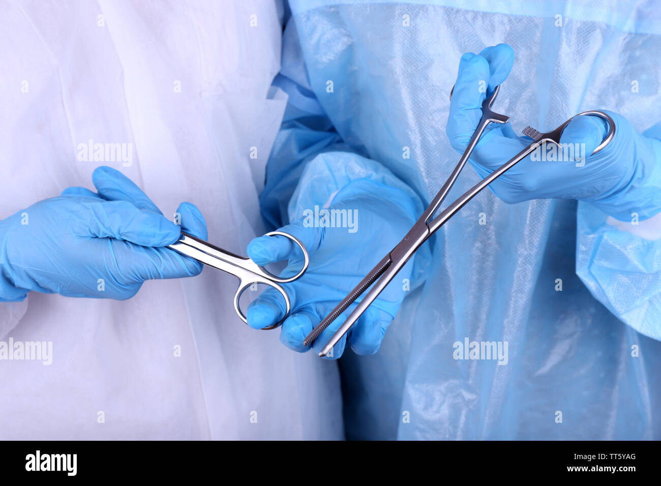 Holding different instruments hi-res stock photography and images - Alamy