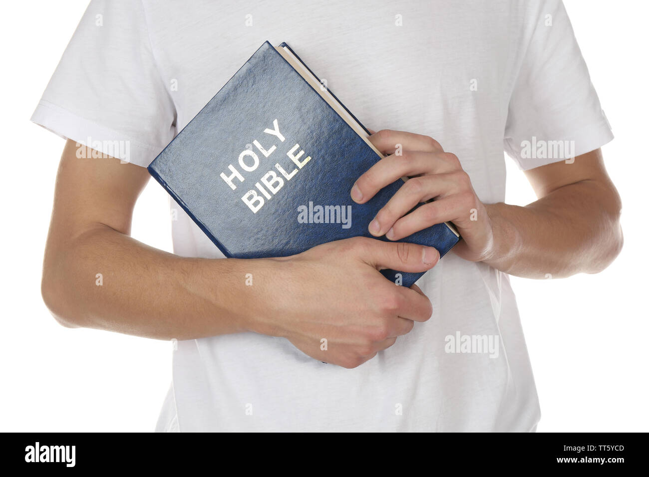 Man holding Bible isolated on white Stock Photo - Alamy