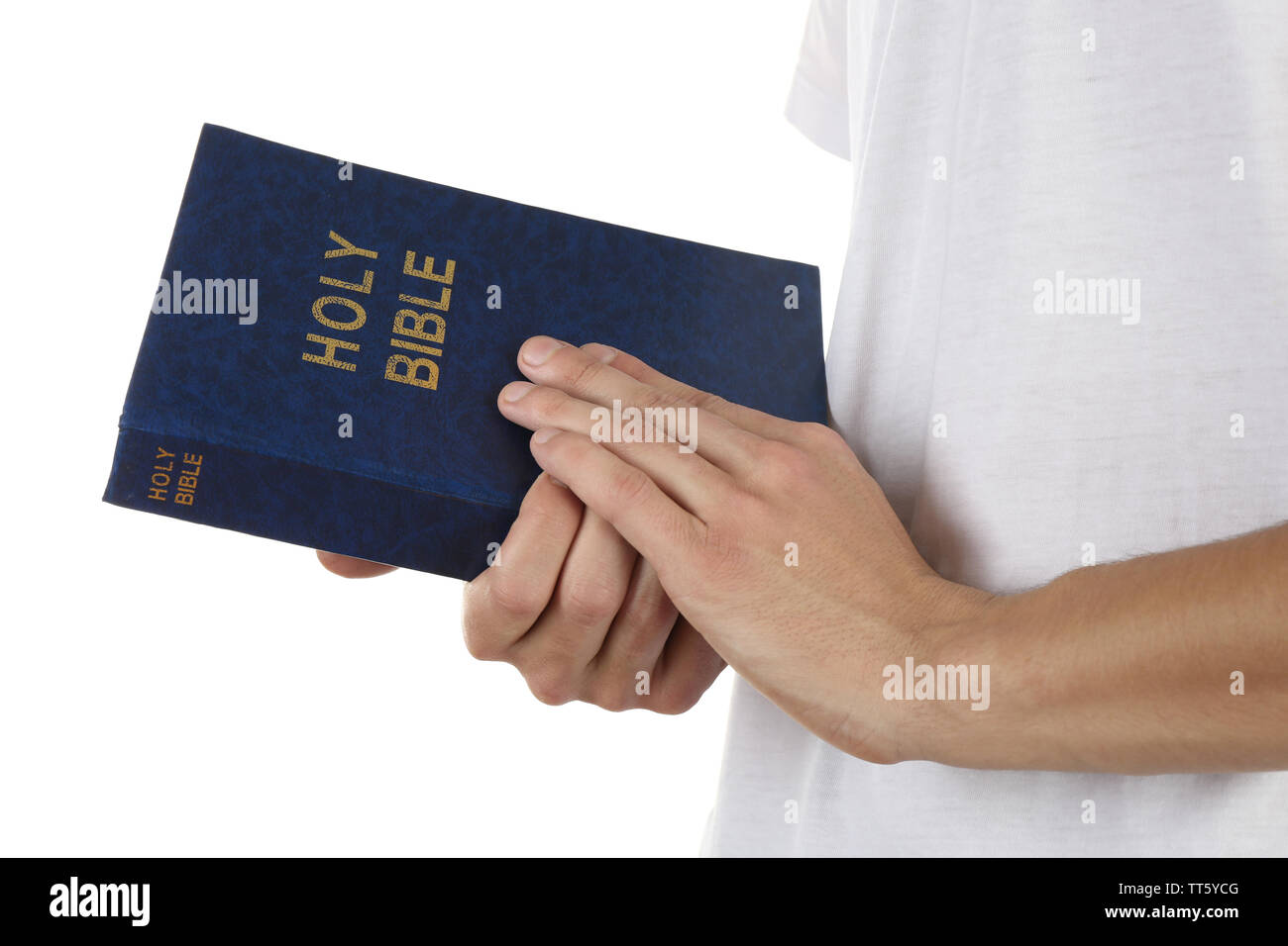 Man holding Bible isolated on white Stock Photo - Alamy