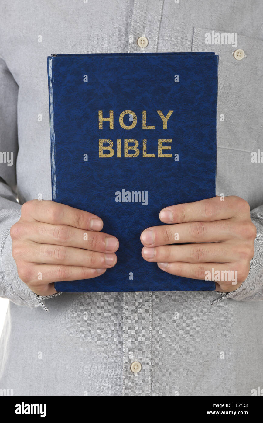 Man holding bible hi-res stock photography and images - Alamy