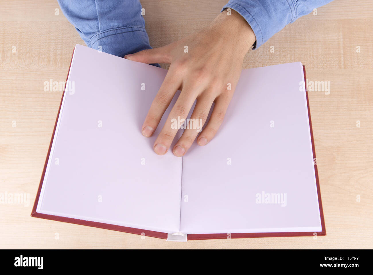 Person holding reading open newspaper hi-res stock photography and ...