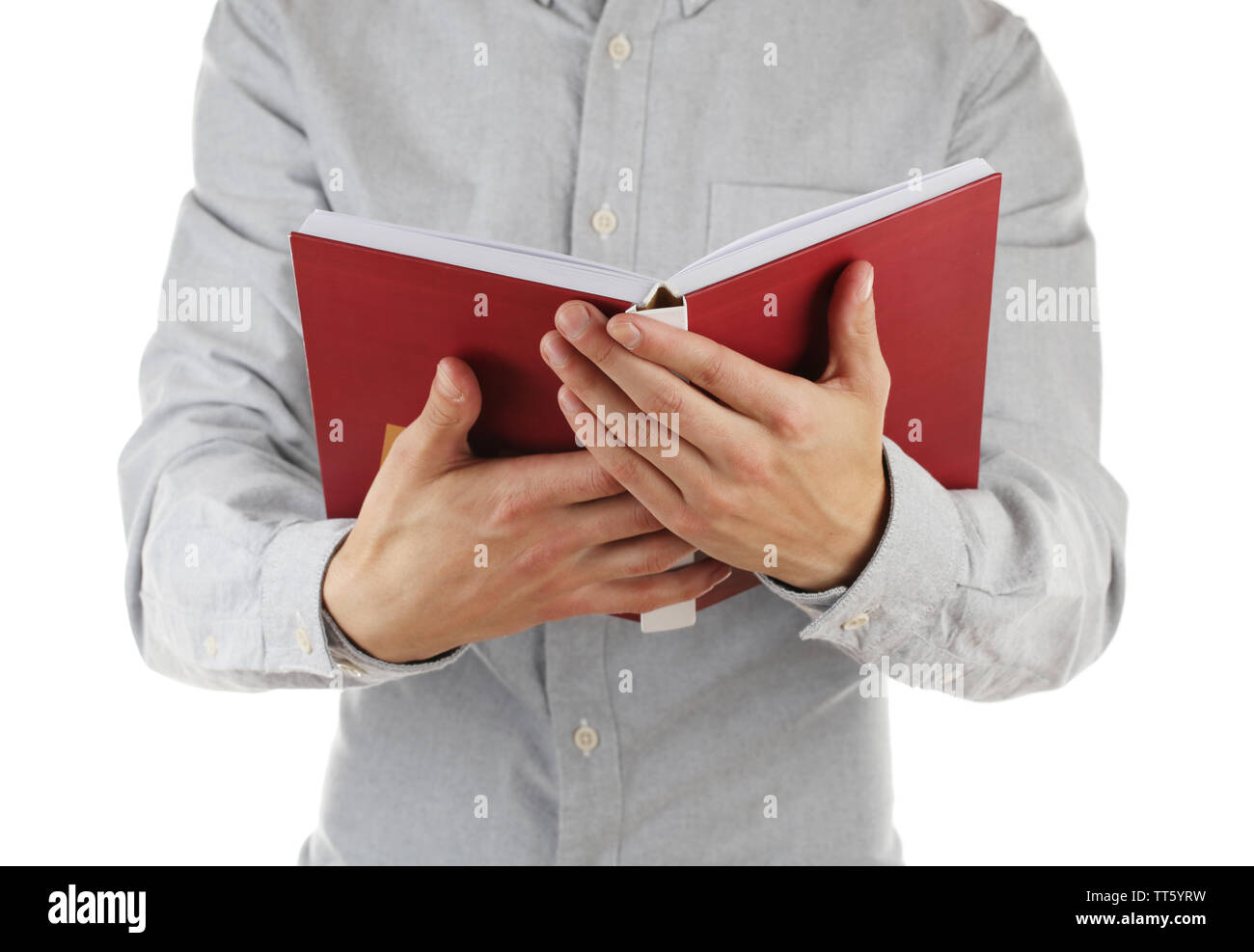 Man hold book isolated on white Stock Photo - Alamy