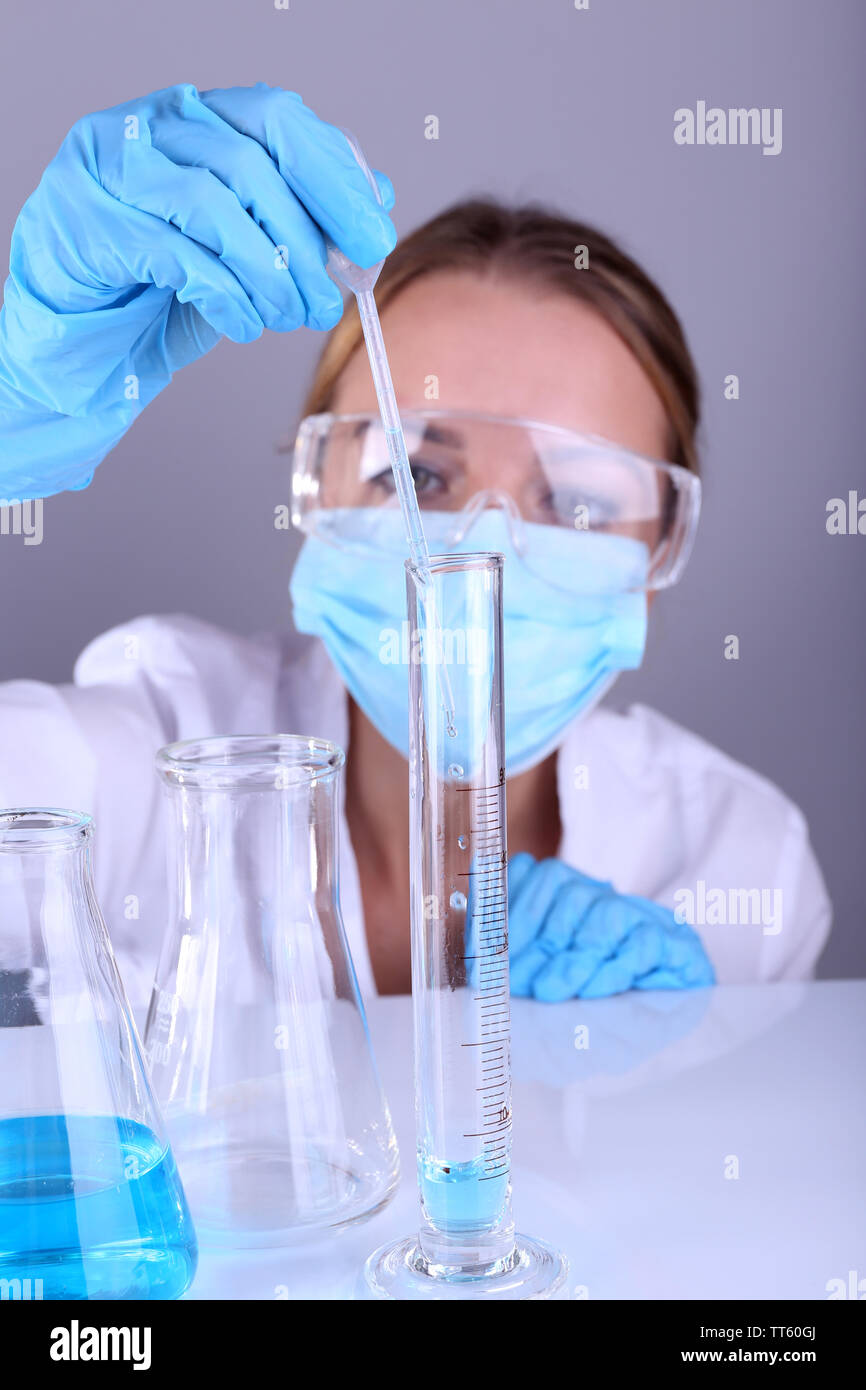 Laboratory assistant making medical test in laboratory Stock Photo - Alamy