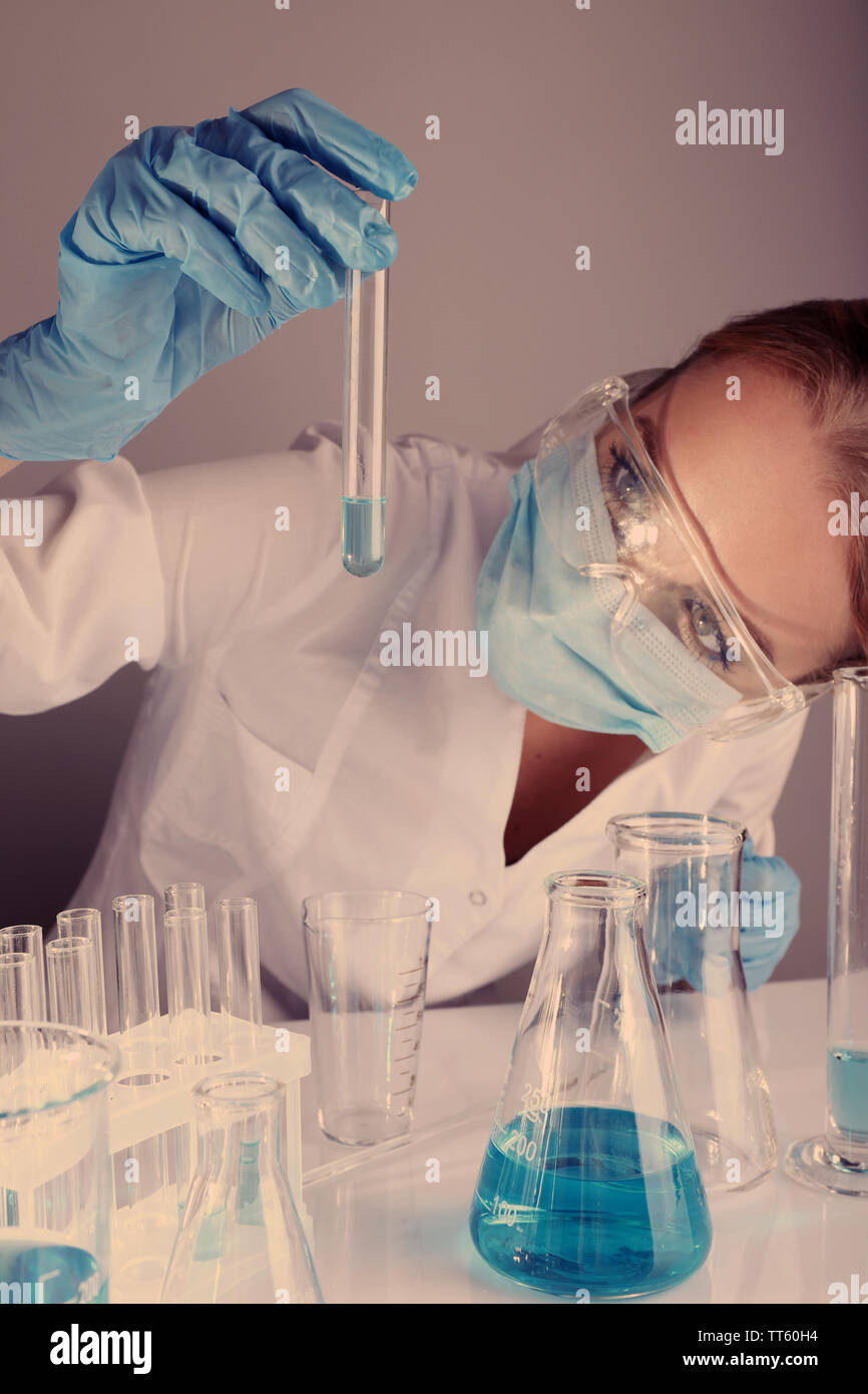 Laboratory assistant making medical test in laboratory Stock Photo - Alamy