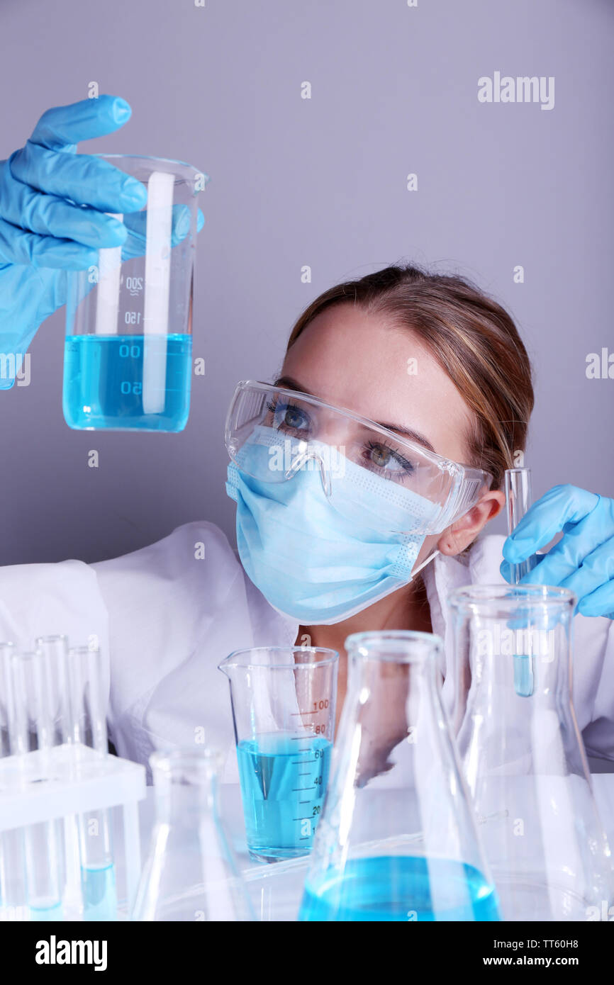 Laboratory assistant making medical test in laboratory Stock Photo - Alamy