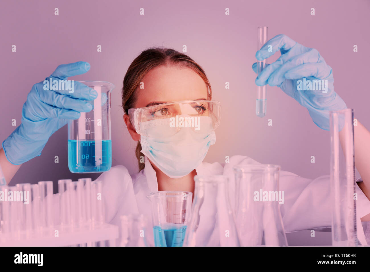 Laboratory assistant making medical test in laboratory Stock Photo - Alamy