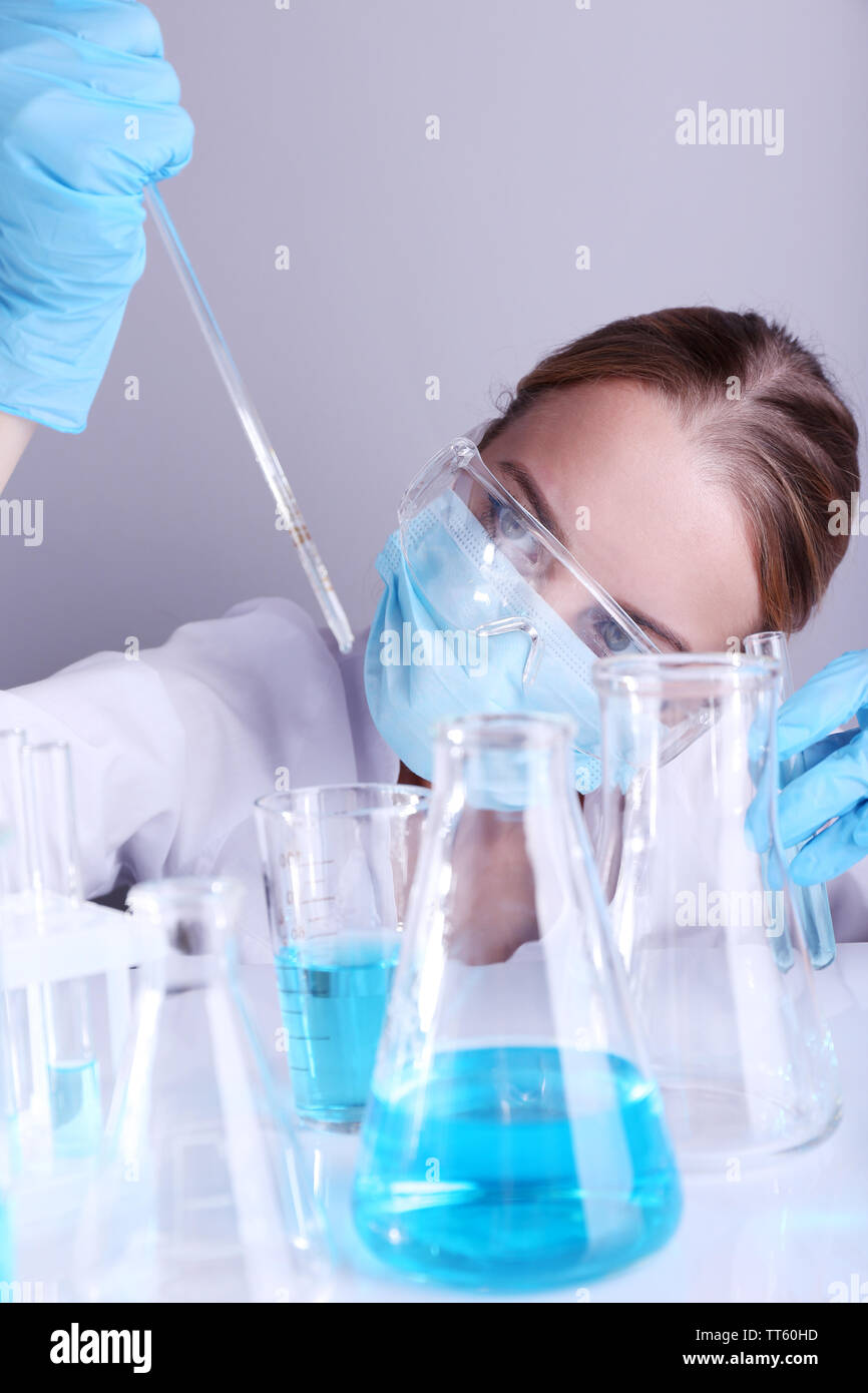 Laboratory assistant making medical test in laboratory Stock Photo - Alamy