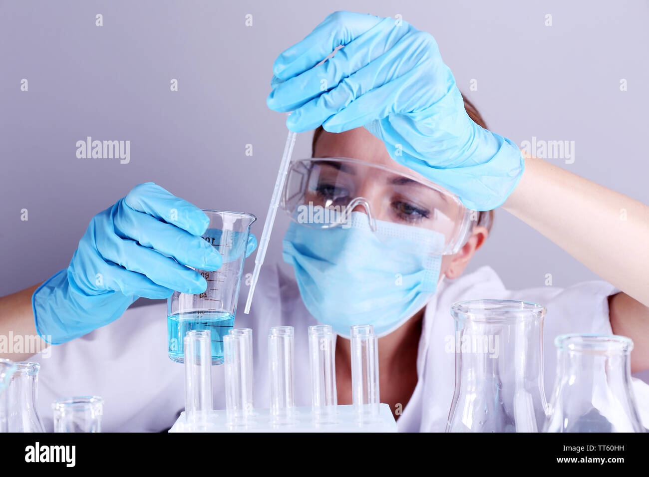 Laboratory assistant making medical test in laboratory Stock Photo - Alamy