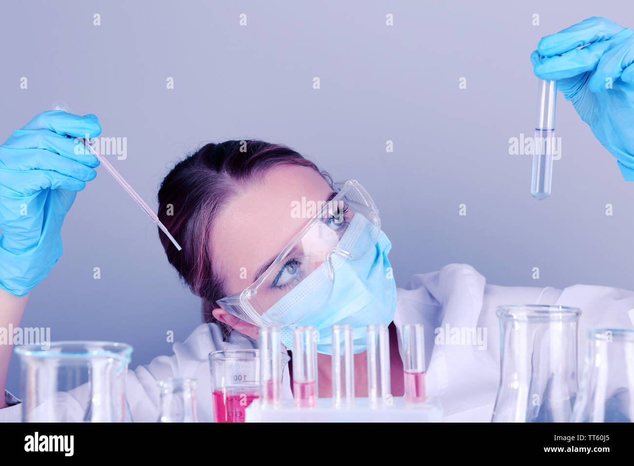 Laboratory assistant making medical test in laboratory Stock Photo - Alamy