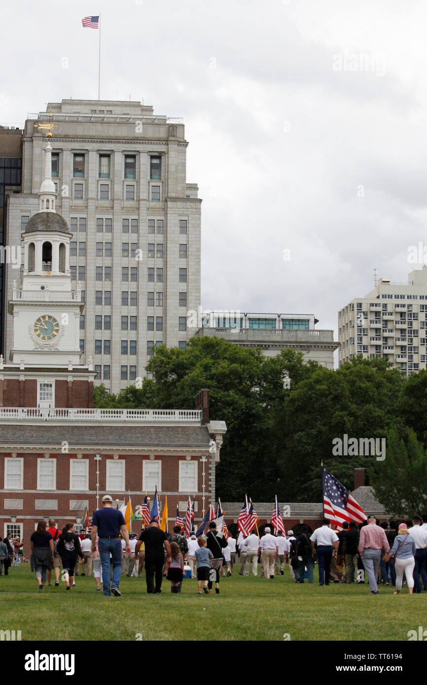 Philadelphia, PA, USA - June 14, 2019: Crowds follow a military parade ...