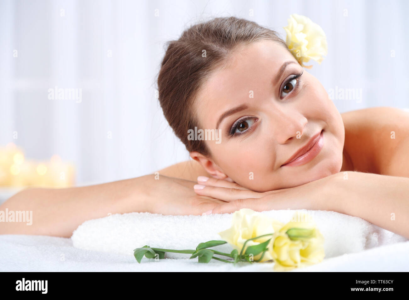 Beautiful young woman having relax in spa salon Stock Photo - Alamy